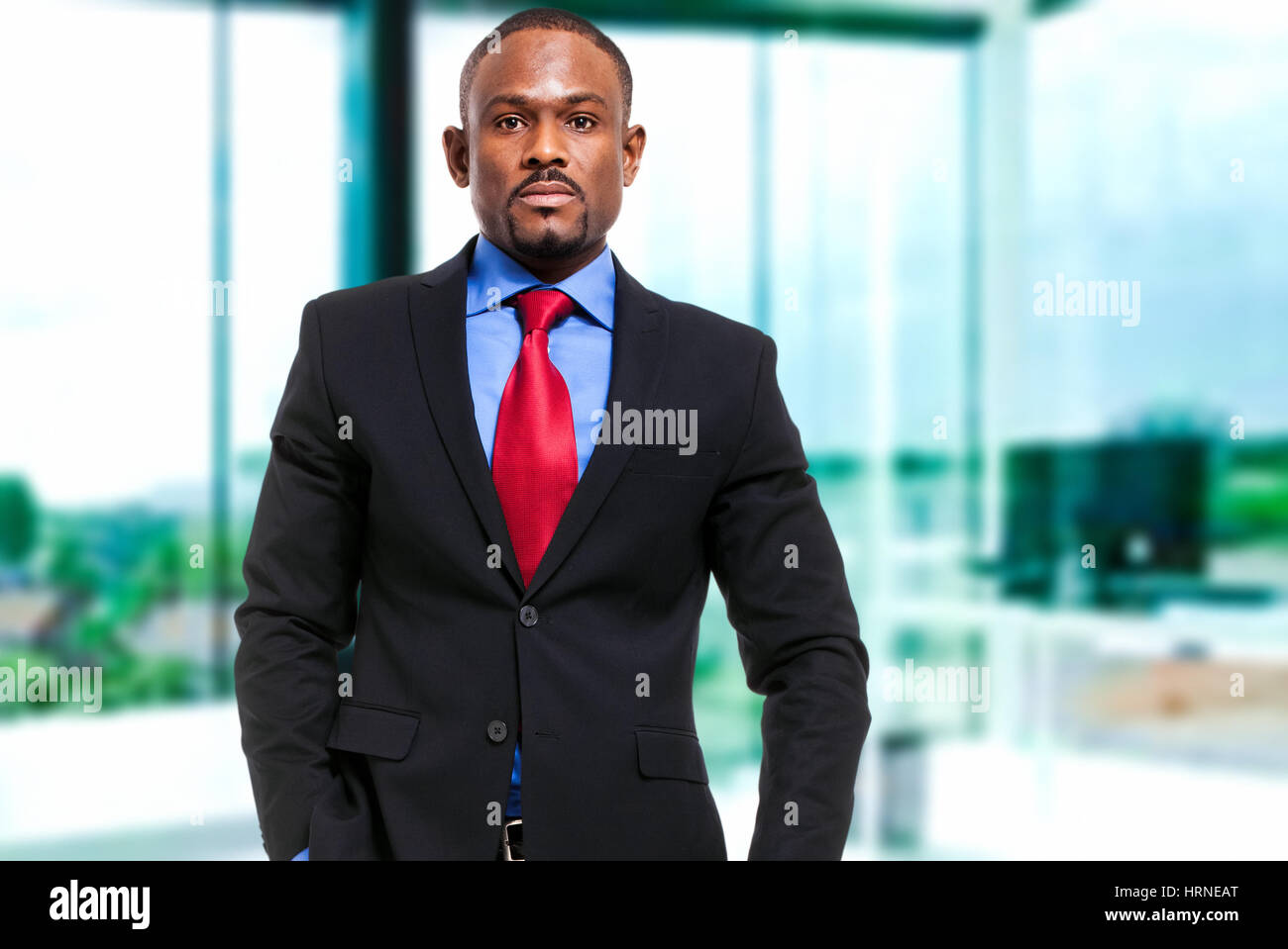 African business man in his office Stock Photo - Alamy