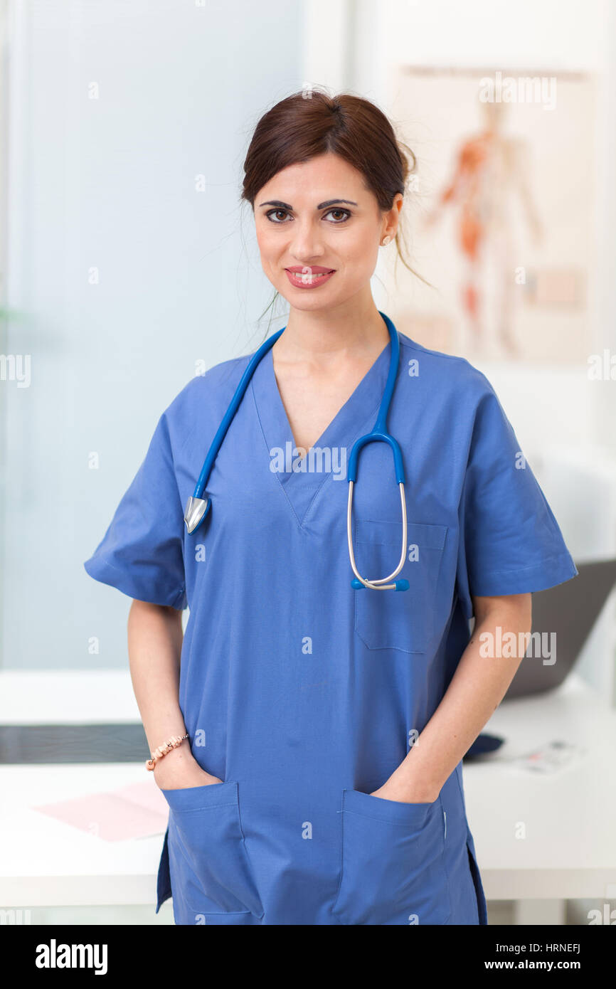 Portrait of a beautiful smiling nurse Stock Photo - Alamy