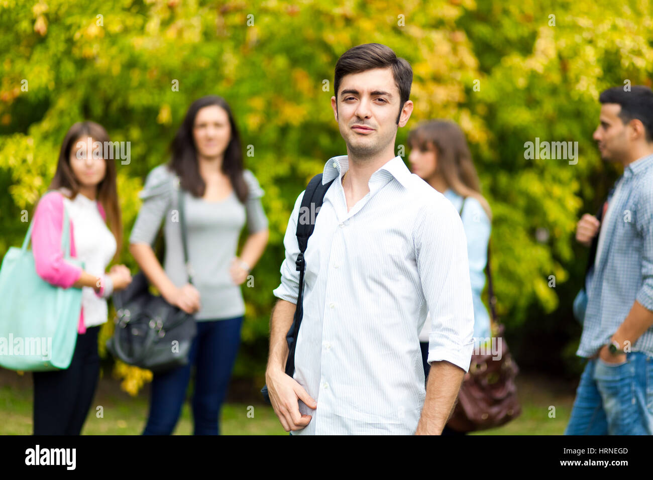 Smiling students at the park Stock Photo - Alamy