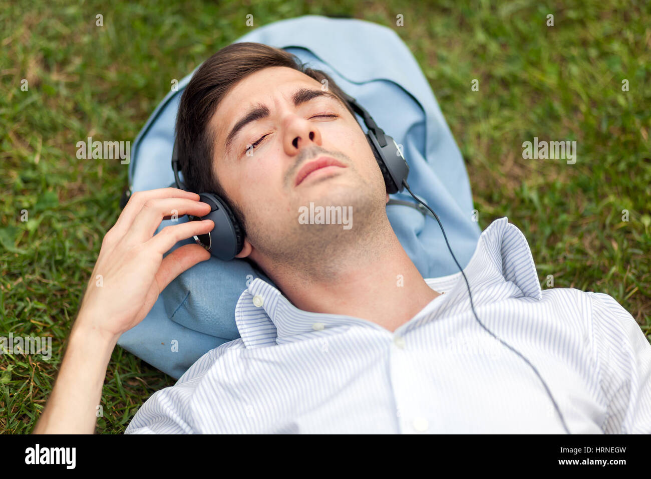 Young man sleeping grass hi-res stock photography and images - Alamy Young man sleeping grass hi-res stock photography and images - Alamy