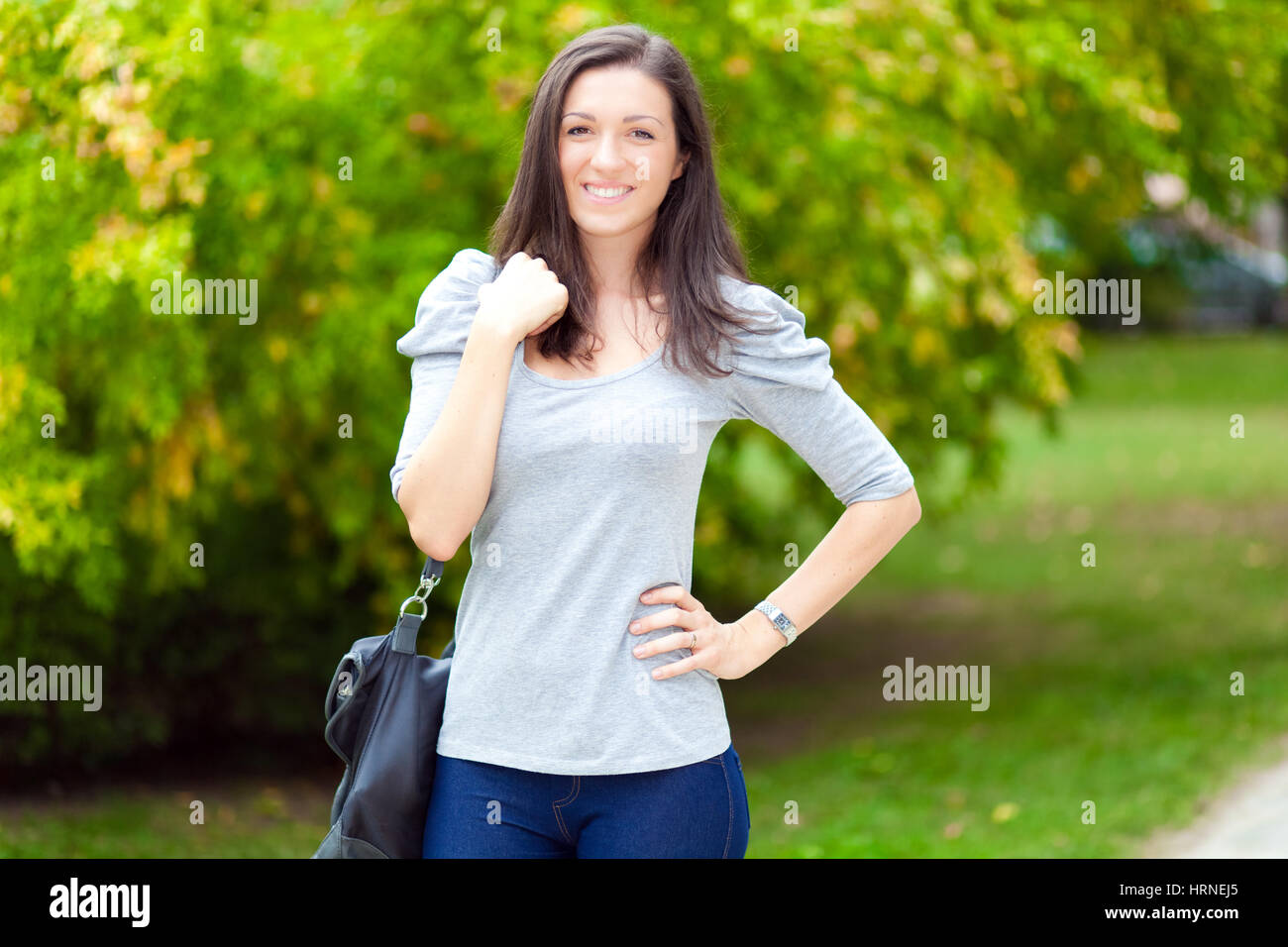Smiling student outdoor Stock Photo - Alamy