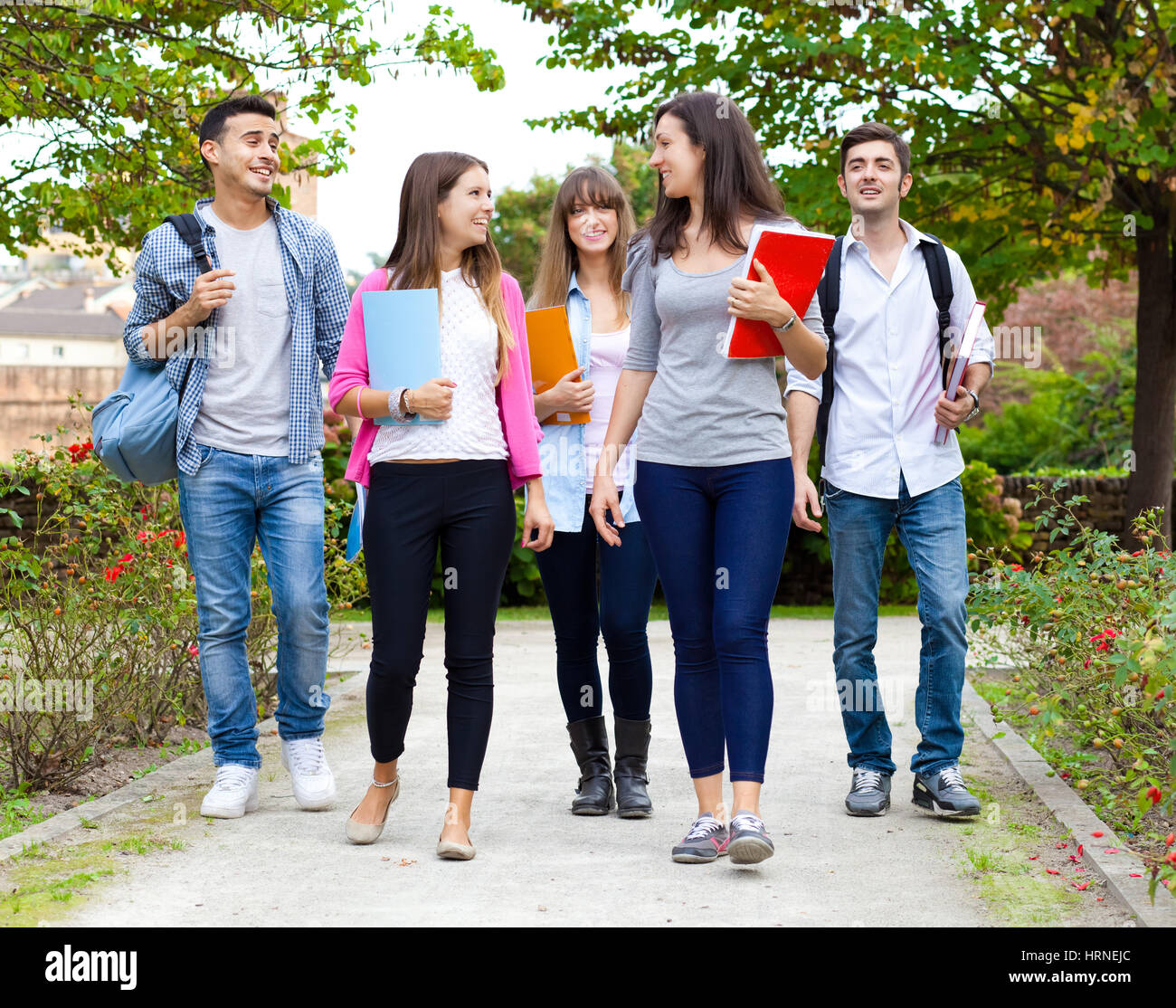 Group of students at the park Stock Photo - Alamy