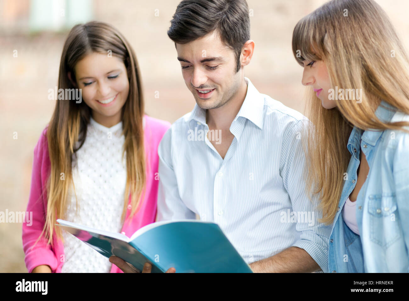 Students in a park Stock Photo - Alamy