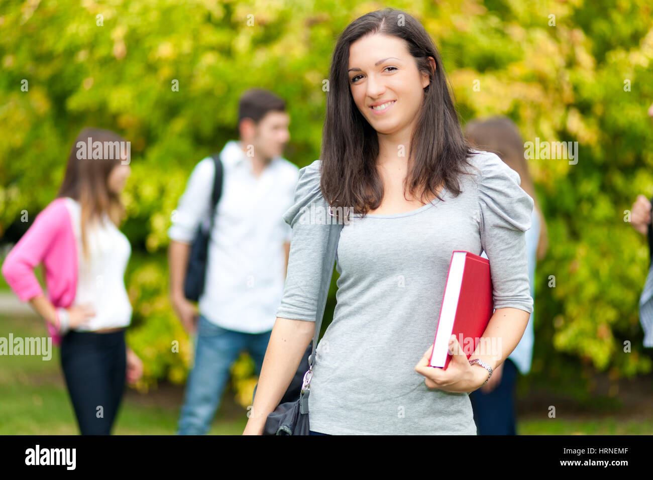Students in a park Stock Photo - Alamy