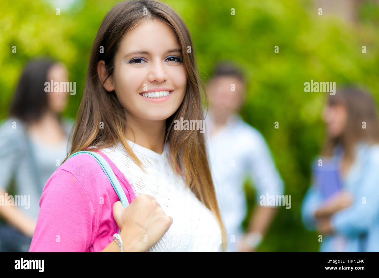 Smiling students at the park Stock Photo - Alamy