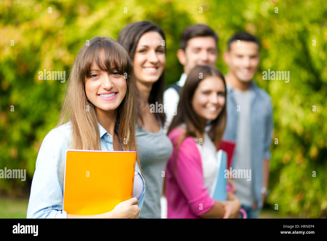 Students group at the park Stock Photo - Alamy