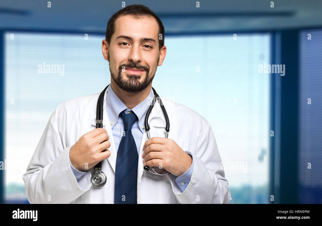 Handsome doctor portrait Stock Photo - Alamy