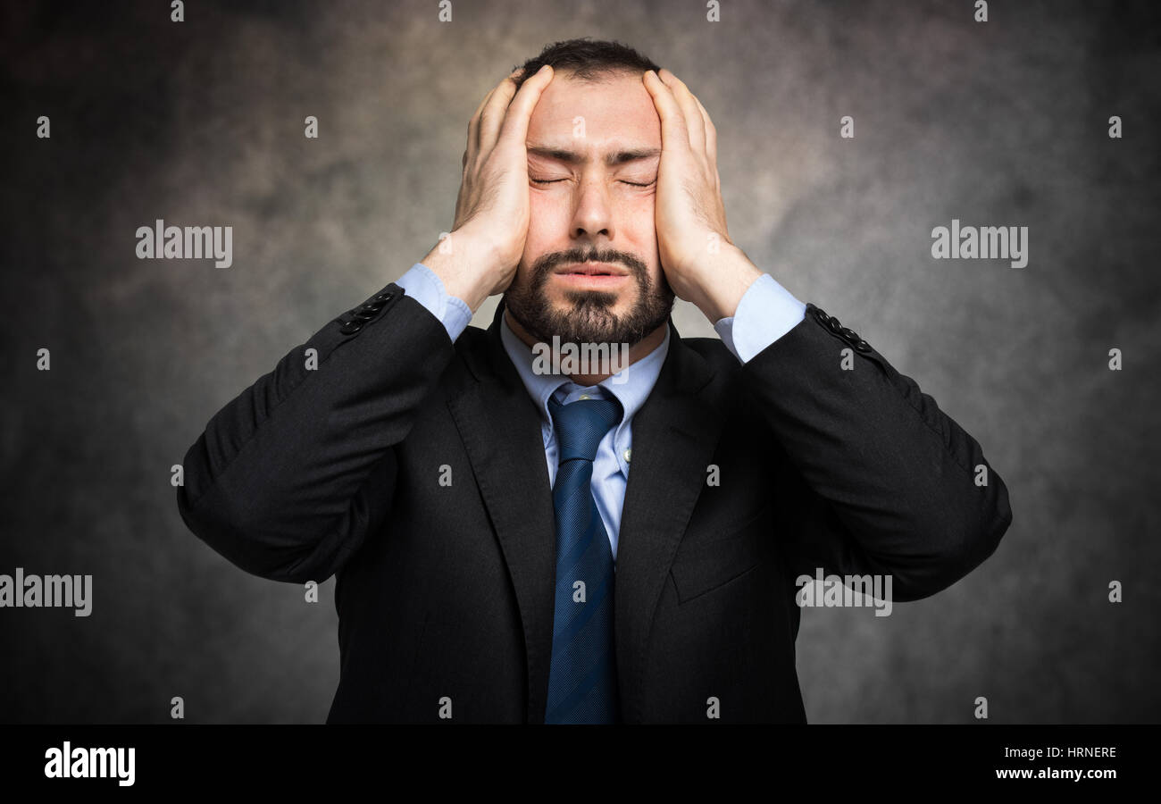 Portrait of a desperate businessman Stock Photo - Alamy