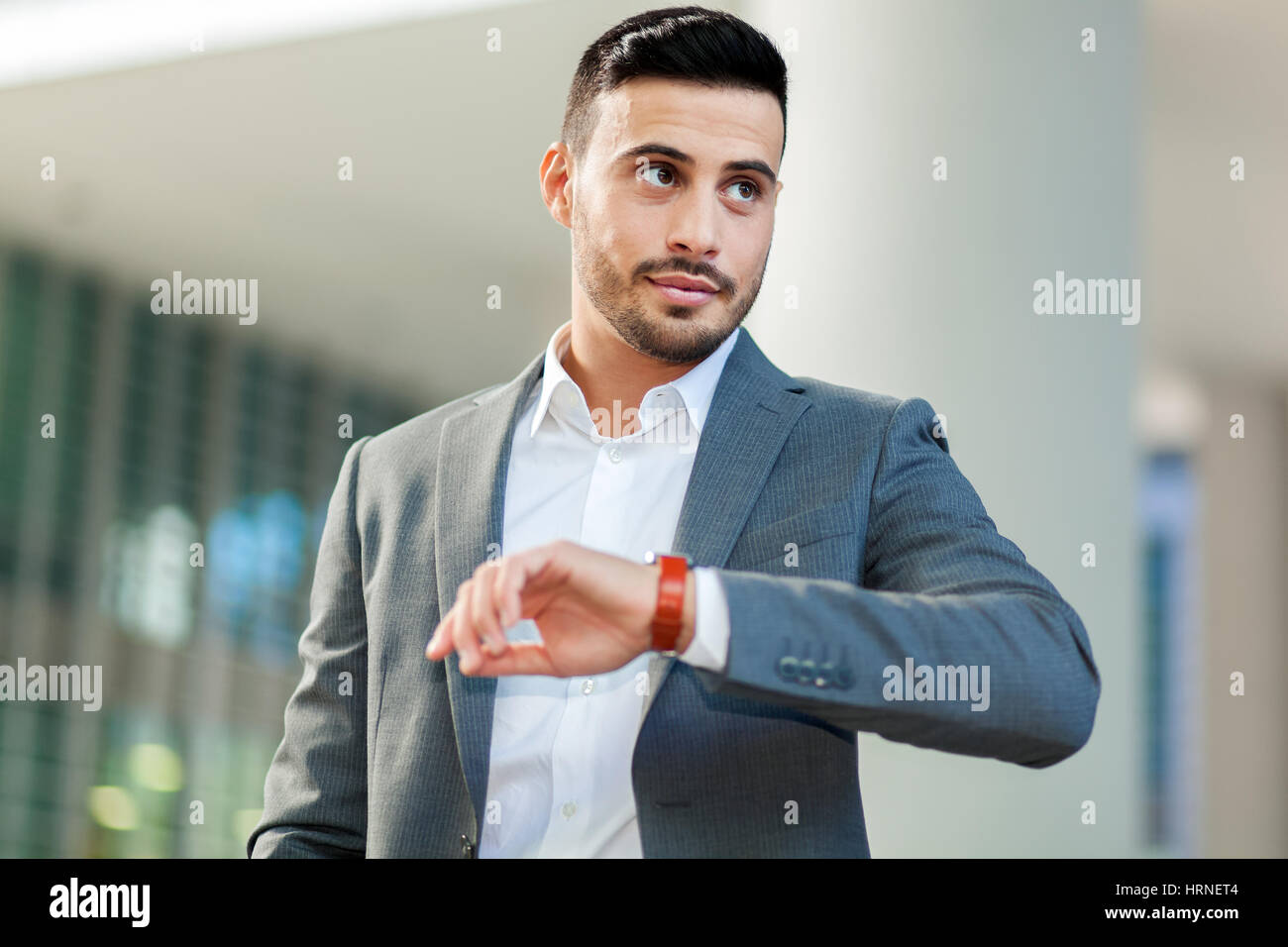 Checking banker hi-res stock photography and images - Alamy