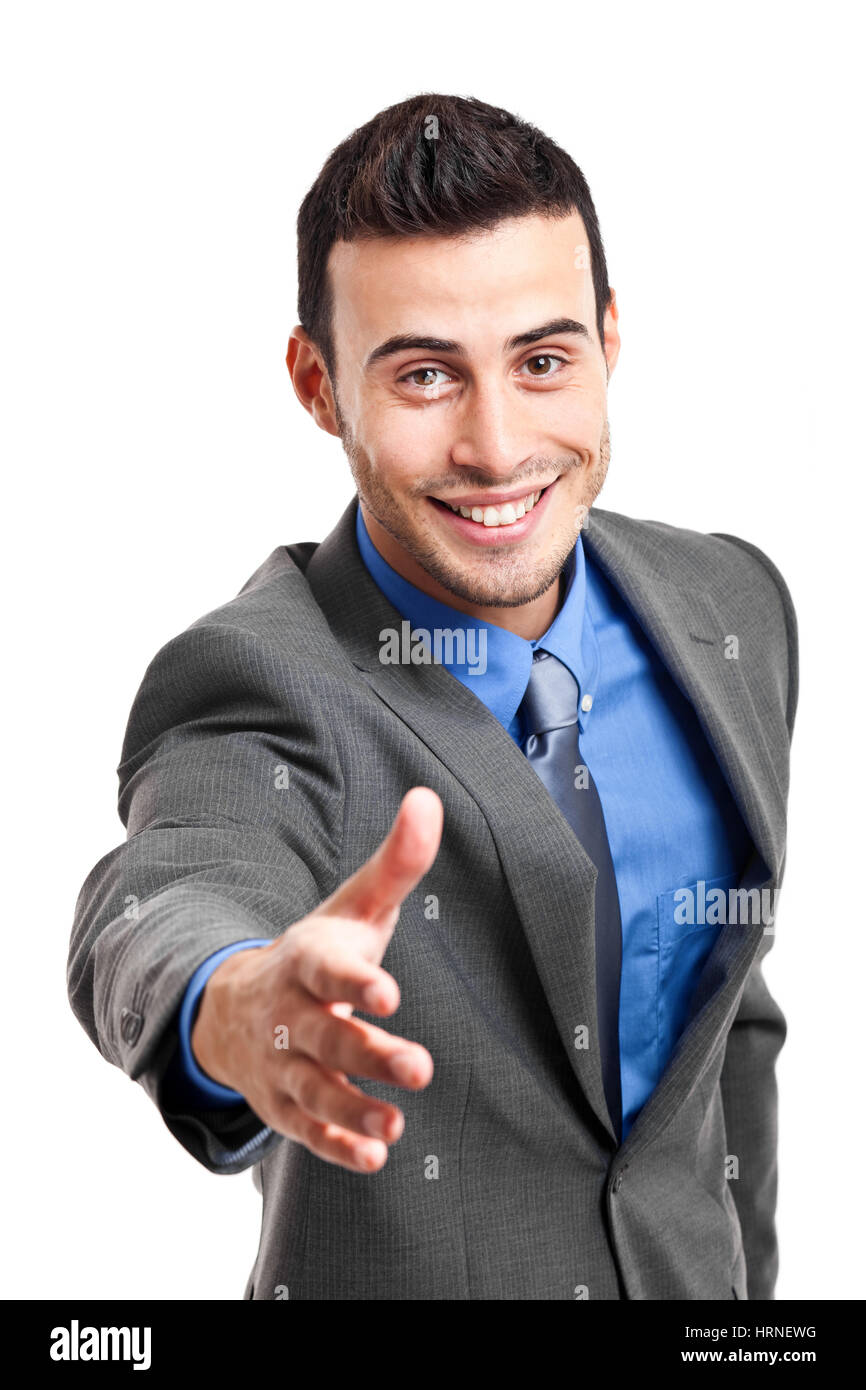 Businessman offering a handshake Stock Photo - Alamy