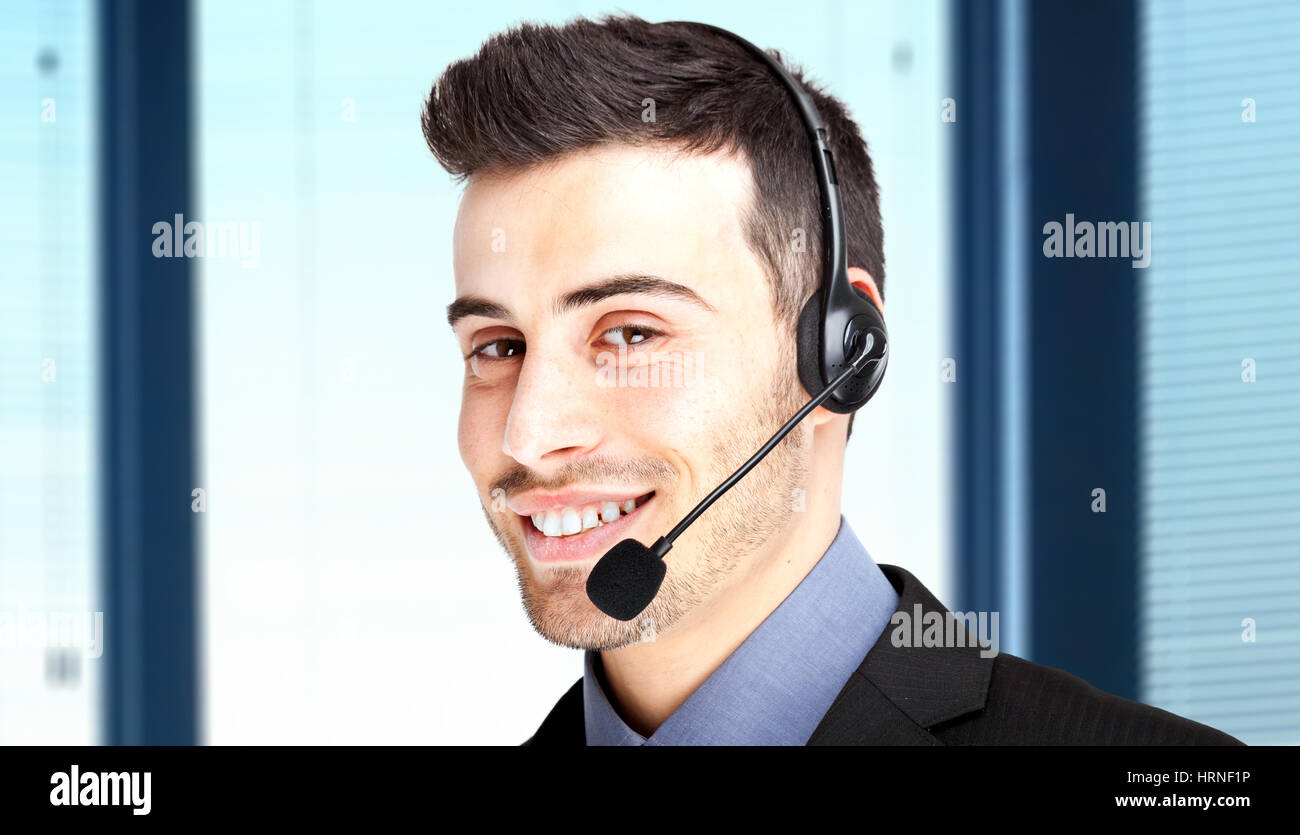 Friendly call center operator Stock Photo - Alamy