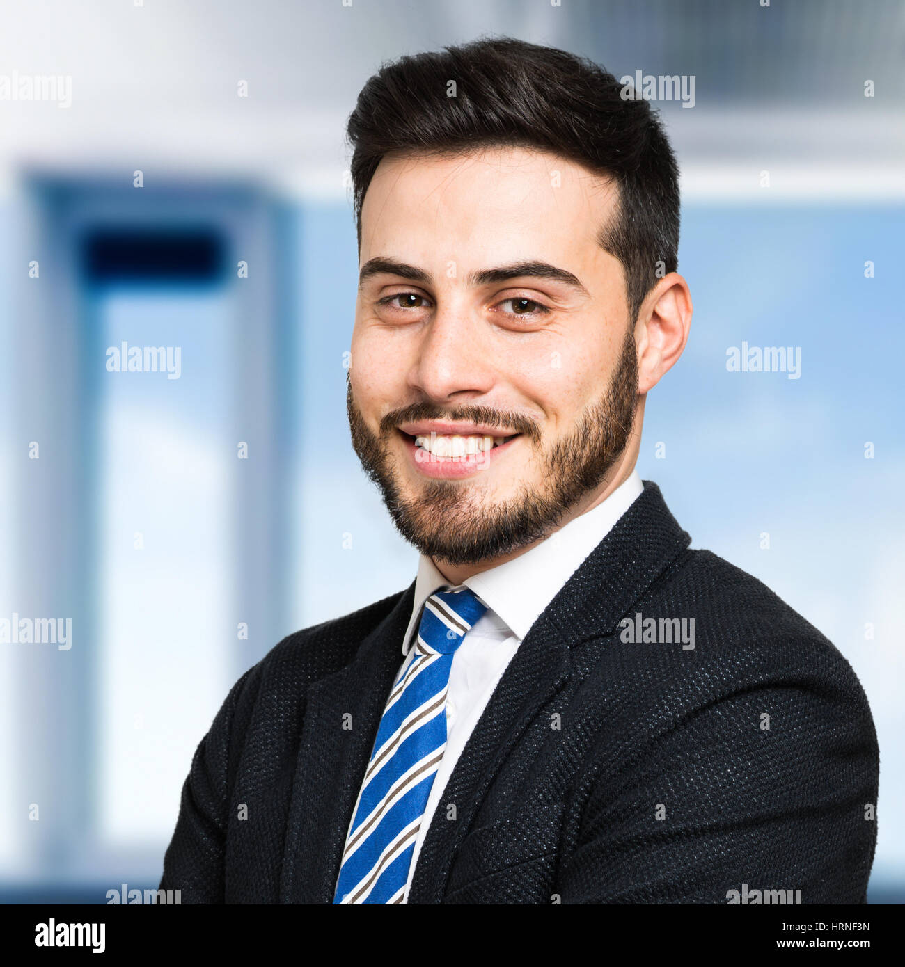 Handsome manager portrait Stock Photo - Alamy