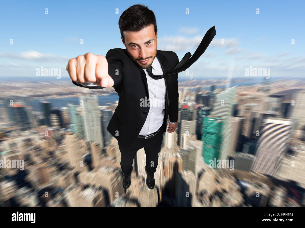 Businessman flying over Manhattan Stock Photo - Alamy