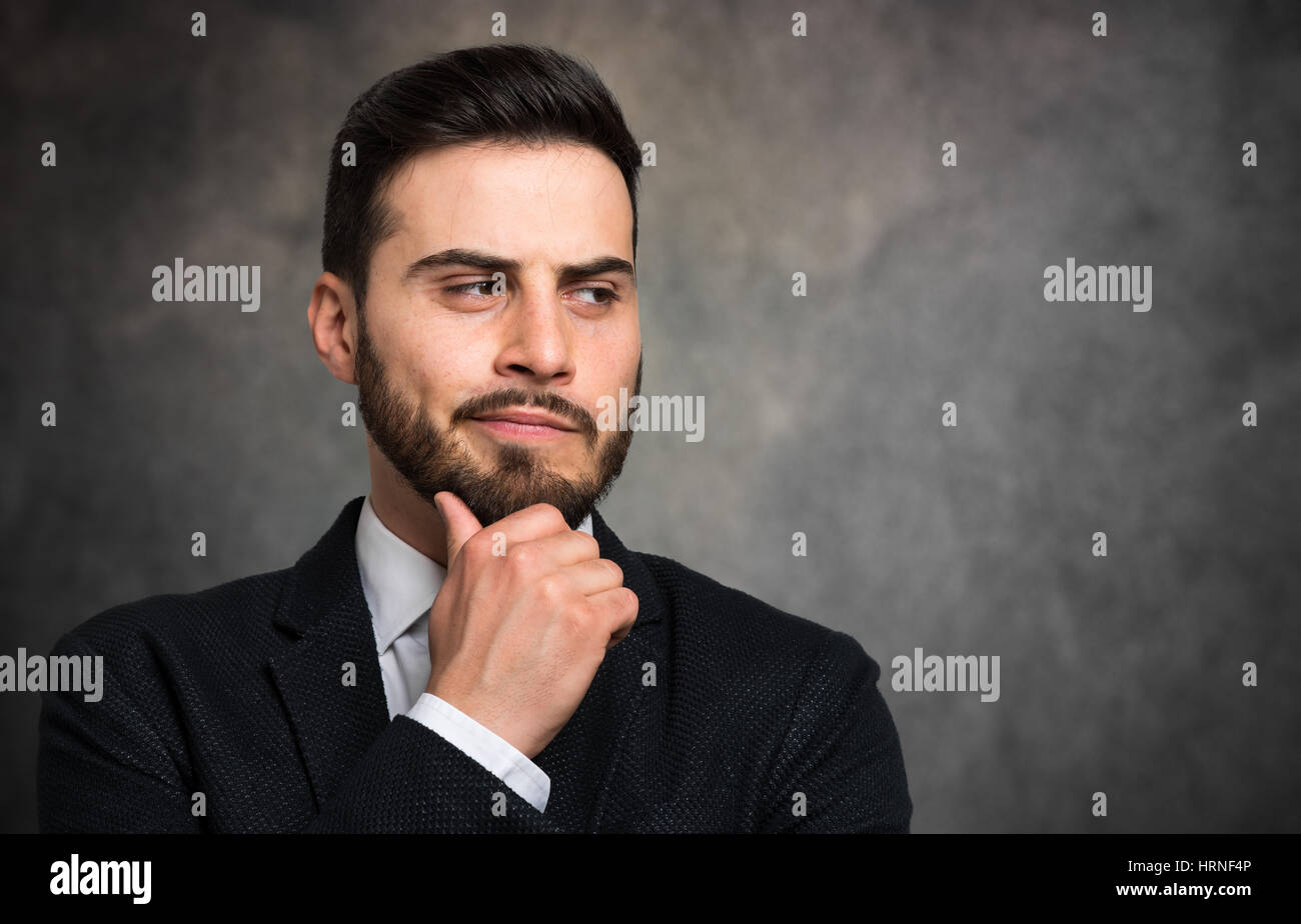 Thoughtful man portrait Stock Photo - Alamy