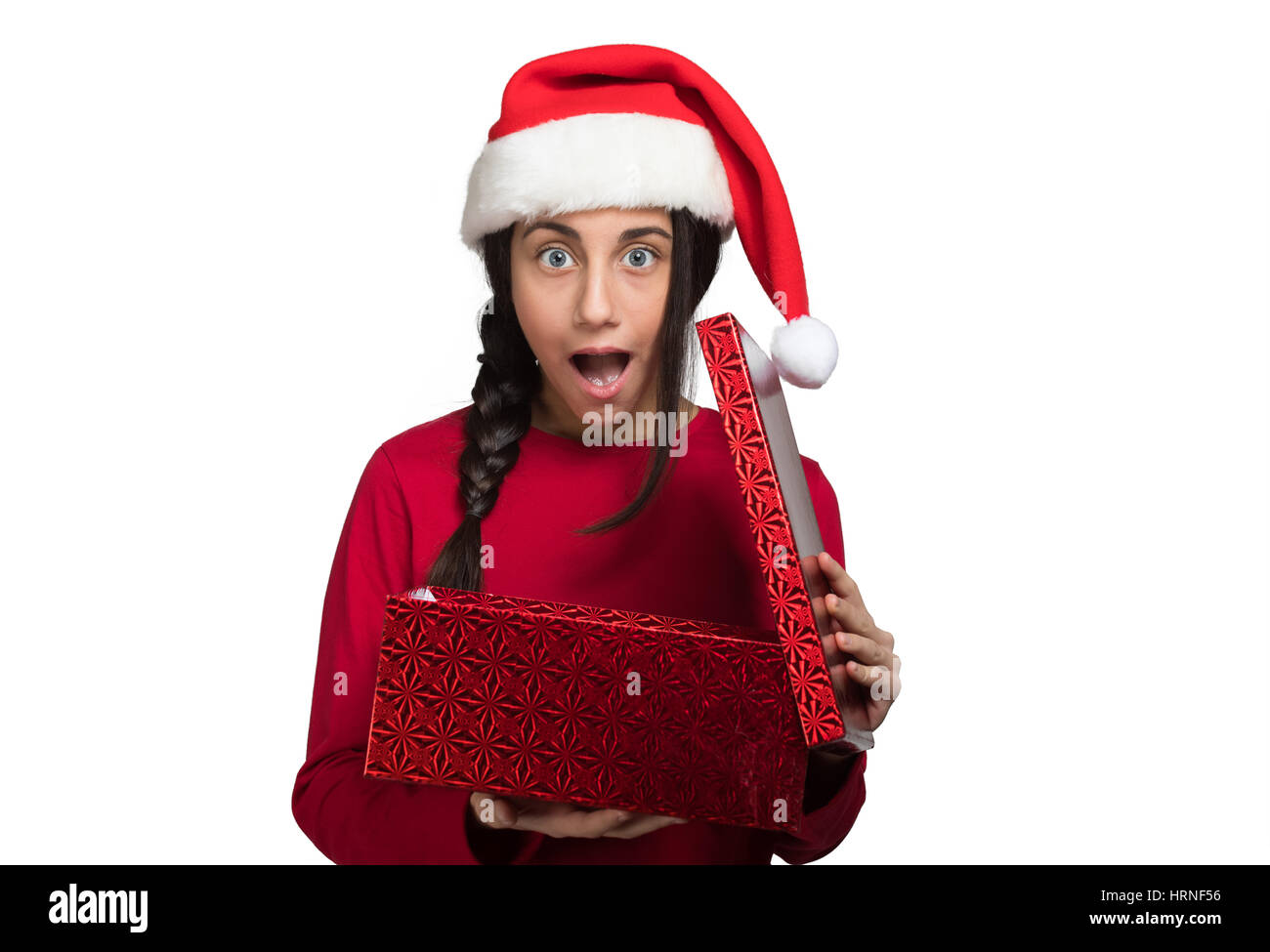 Young teenage girl opening a present Stock Photo - Alamy