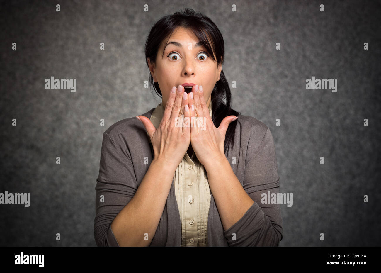 Beautiful surprised woman Stock Photo - Alamy
