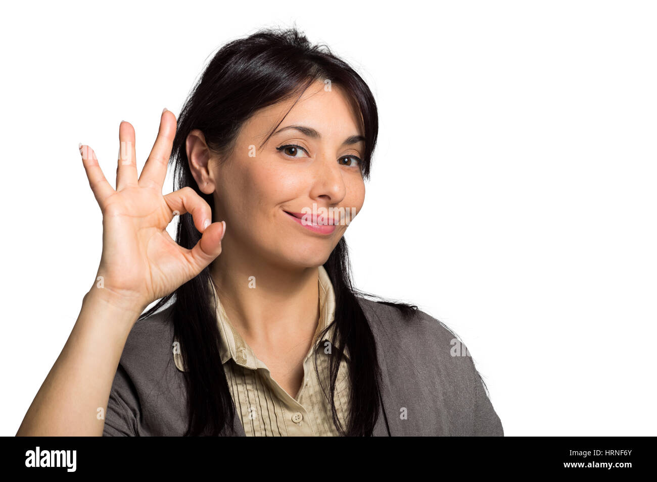 Portrait of beautiful girl showing OK sign and smiling Stock Photo - Alamy