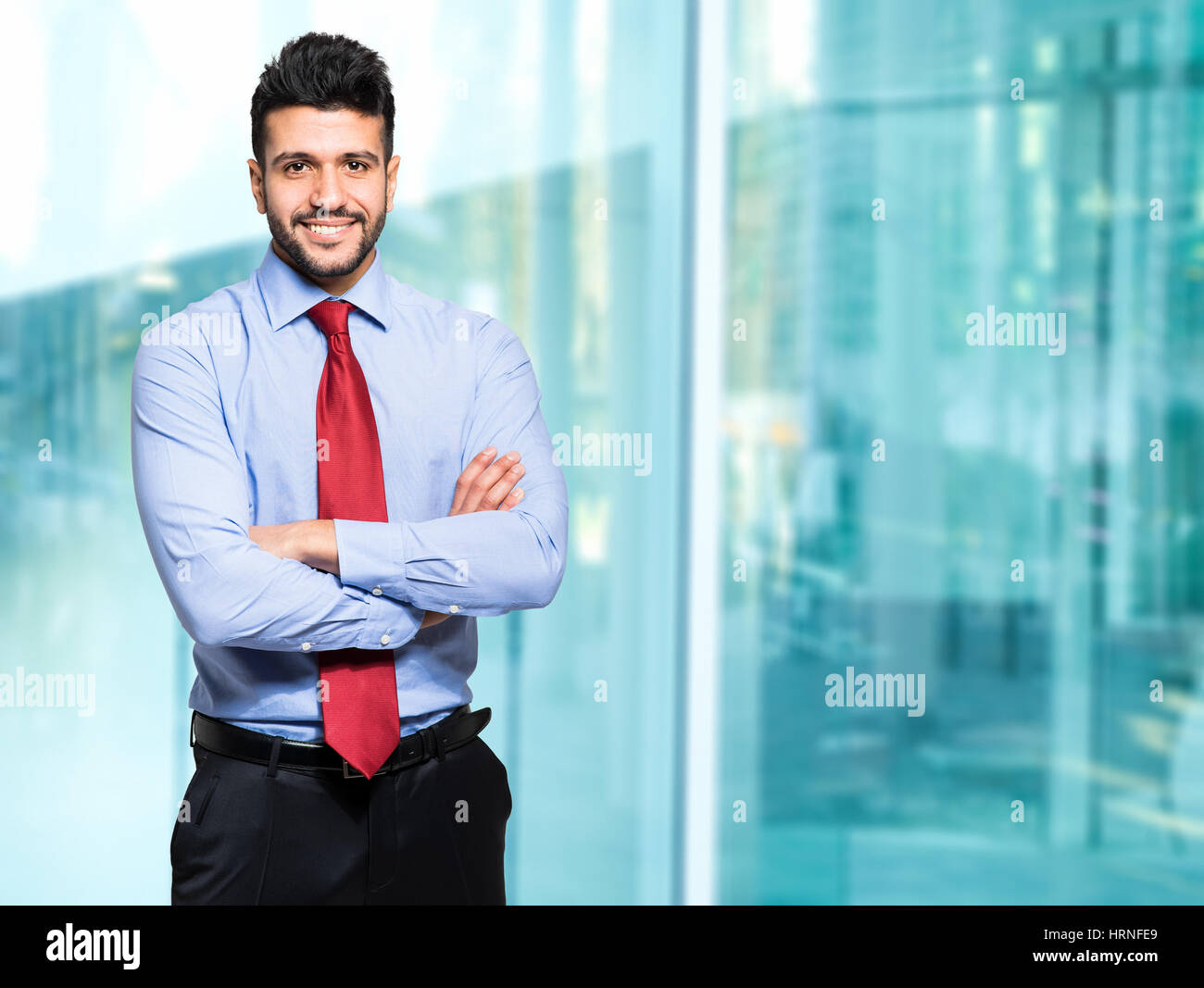 Portrait of a friendly businessman Stock Photo - Alamy