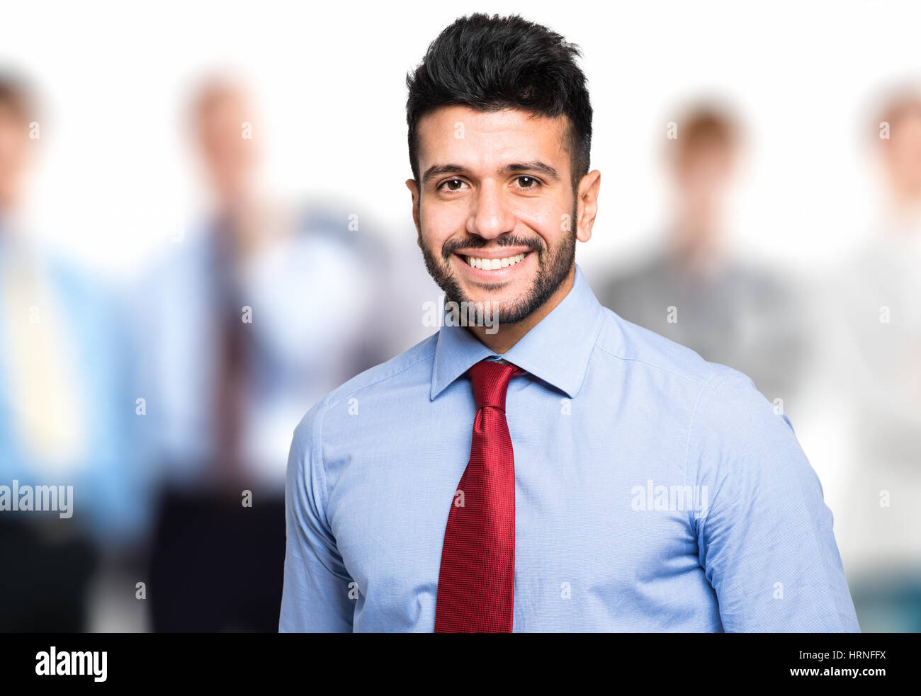 Portrait of a friendly businessman Stock Photo - Alamy