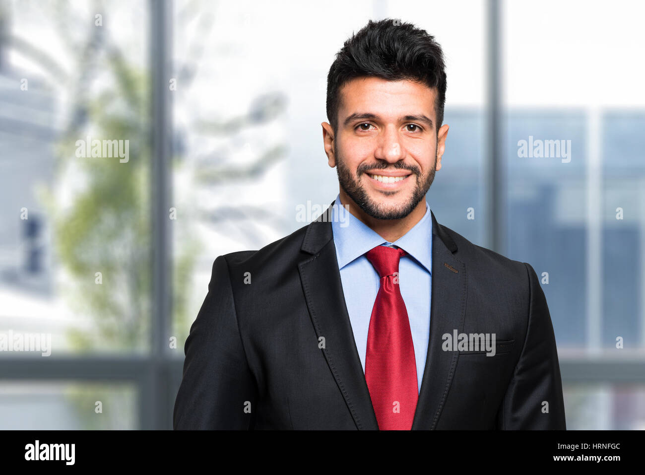 Smiling manager portrait Stock Photo - Alamy