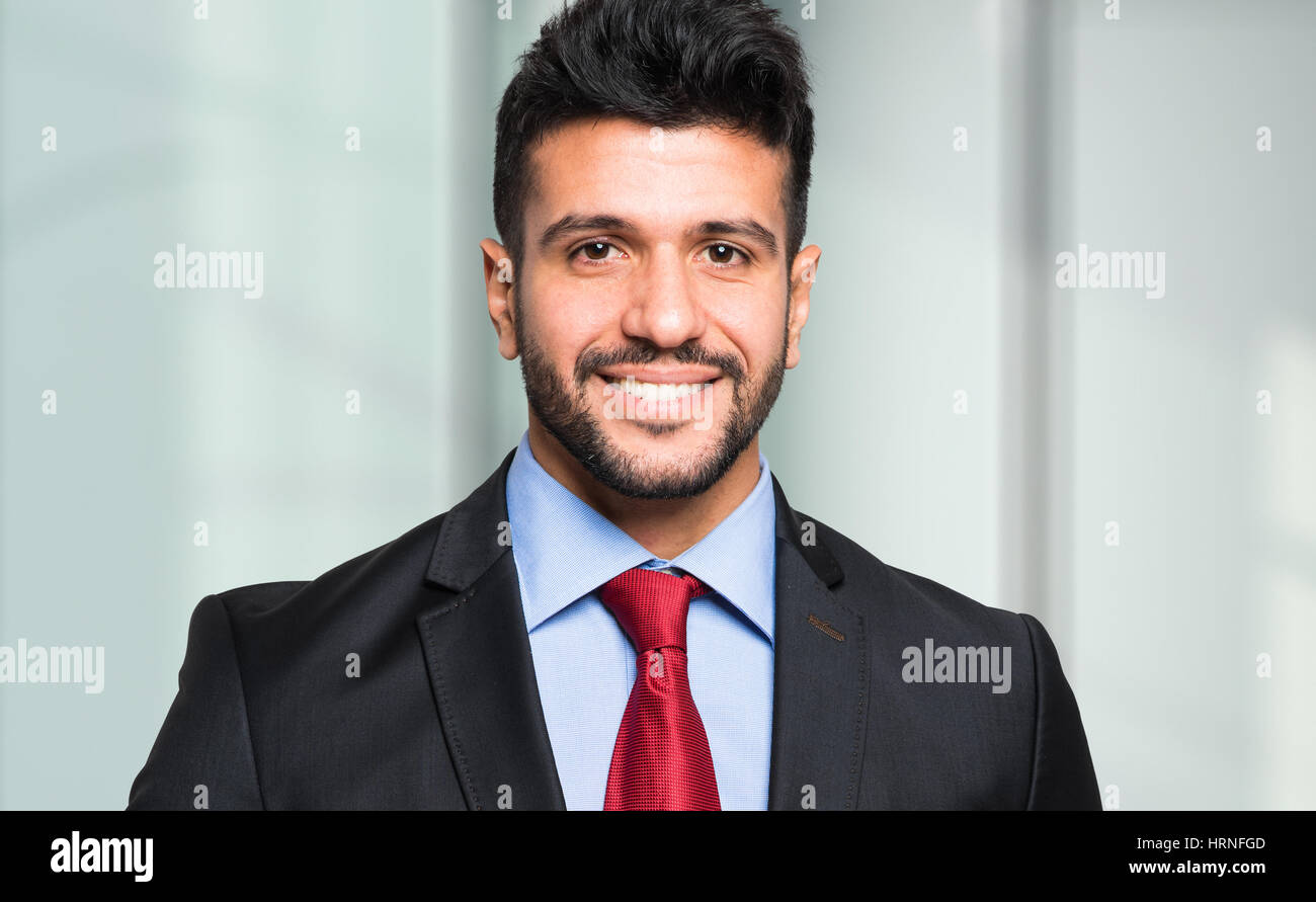 Smiling manager portrait Stock Photo - Alamy