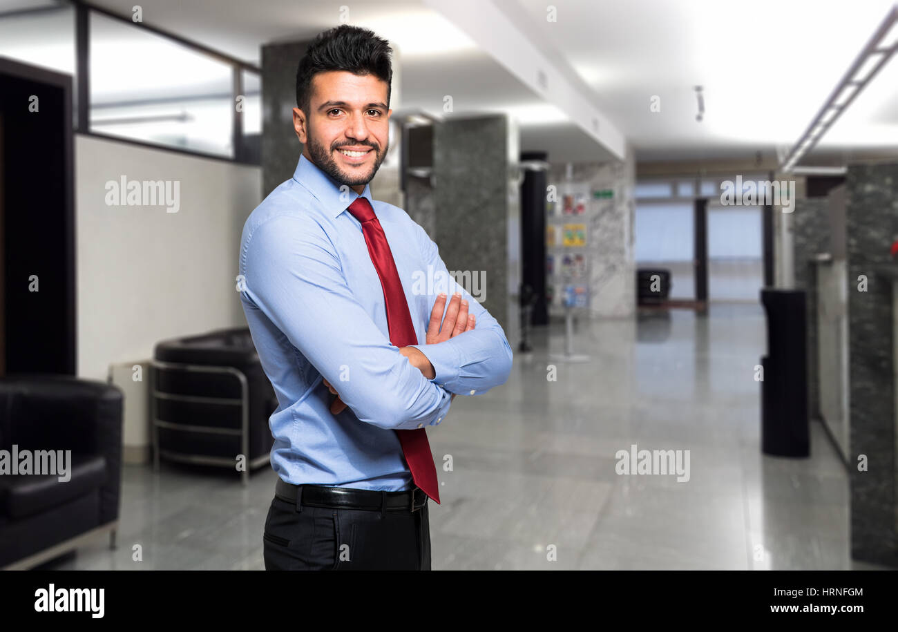 Handsome manager in his office Stock Photo - Alamy