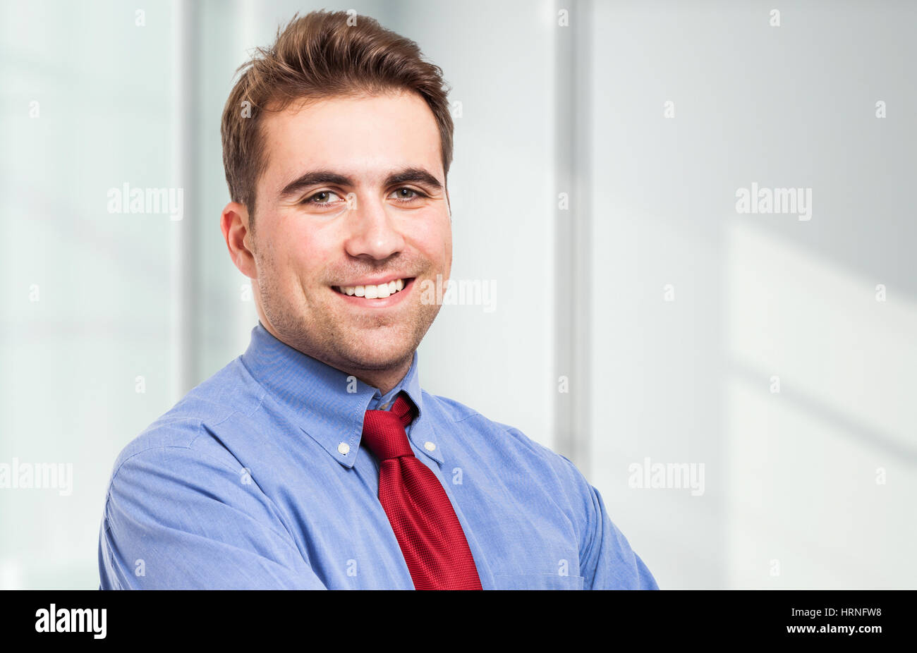 Smiling manager portrait Stock Photo - Alamy