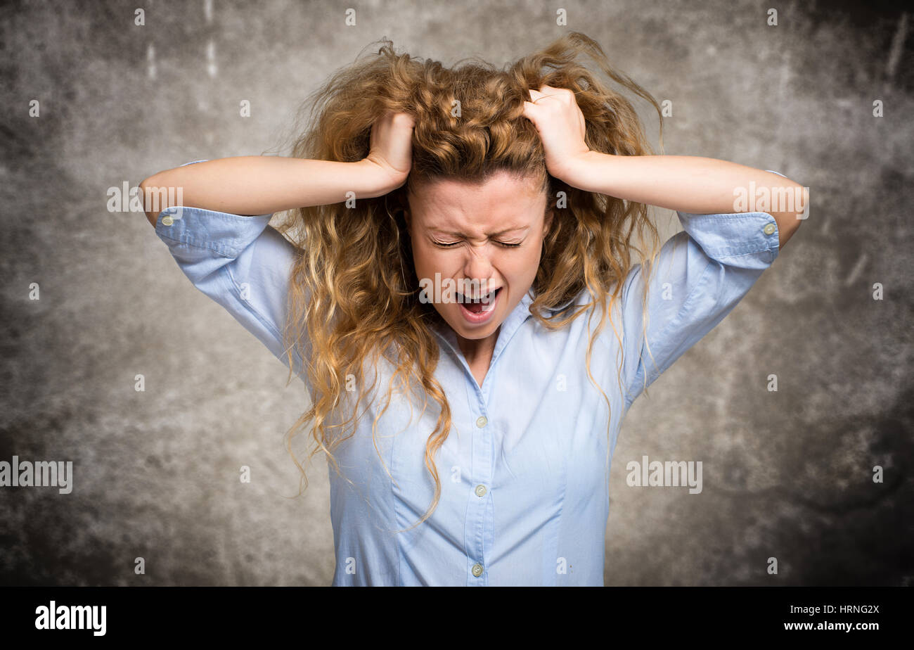Angry and stressed woman Stock Photo - Alamy