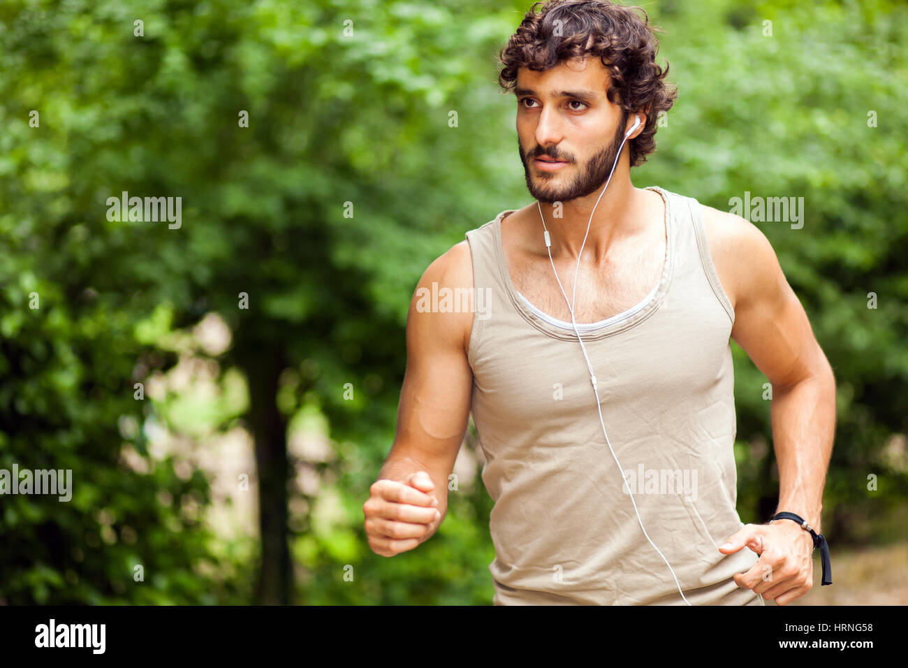 Young man doing jogging outdoor Stock Photo - Alamy