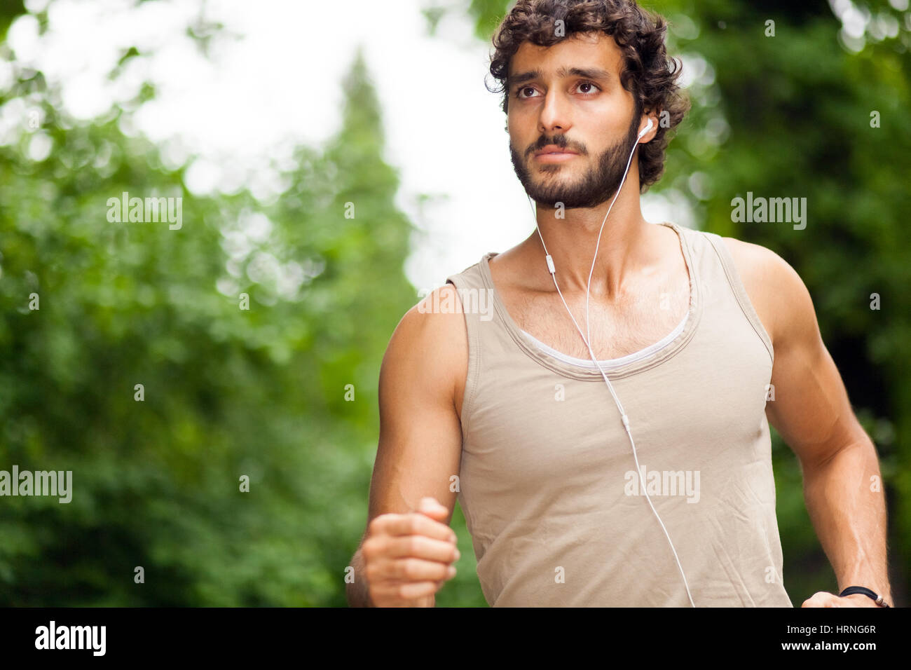 Man running in a park Stock Photo - Alamy