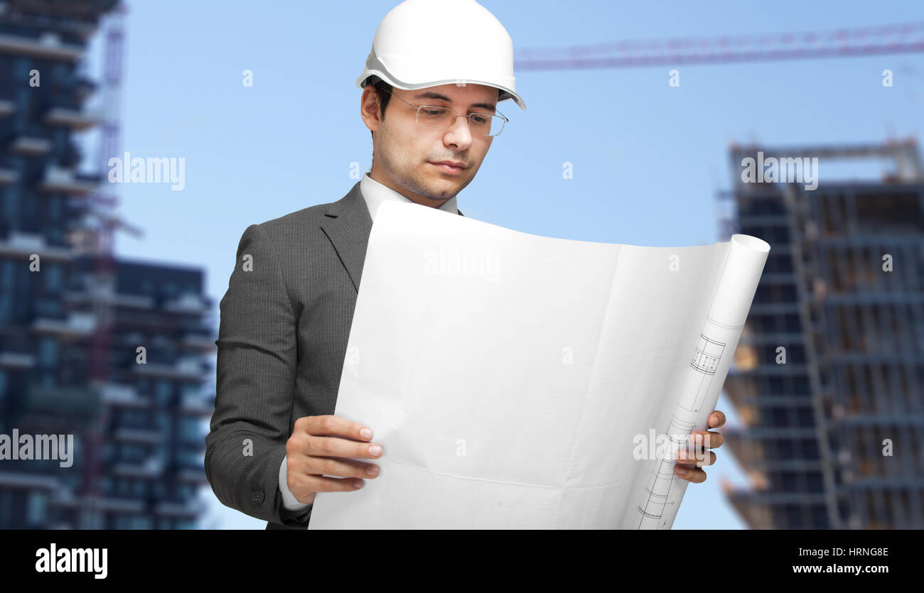 Architect in a construction site Stock Photo - Alamy