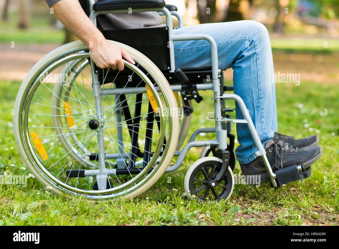 Detail of a man using a wheelchair Stock Photo - Alamy