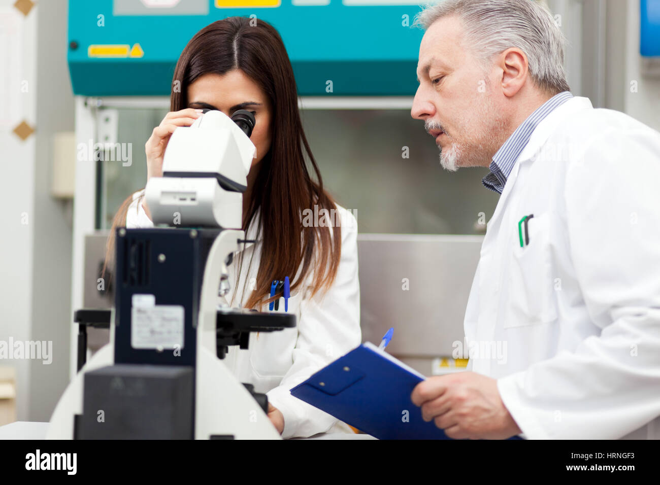 Scientist researching hi-res stock photography and images - Alamy