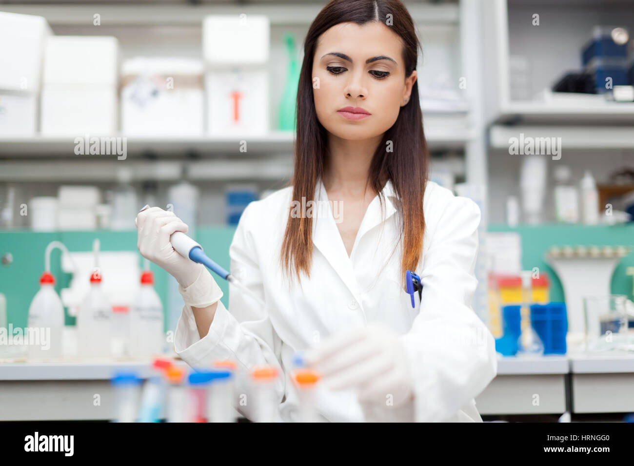 Researcher working in a laboratory Stock Photo - Alamy