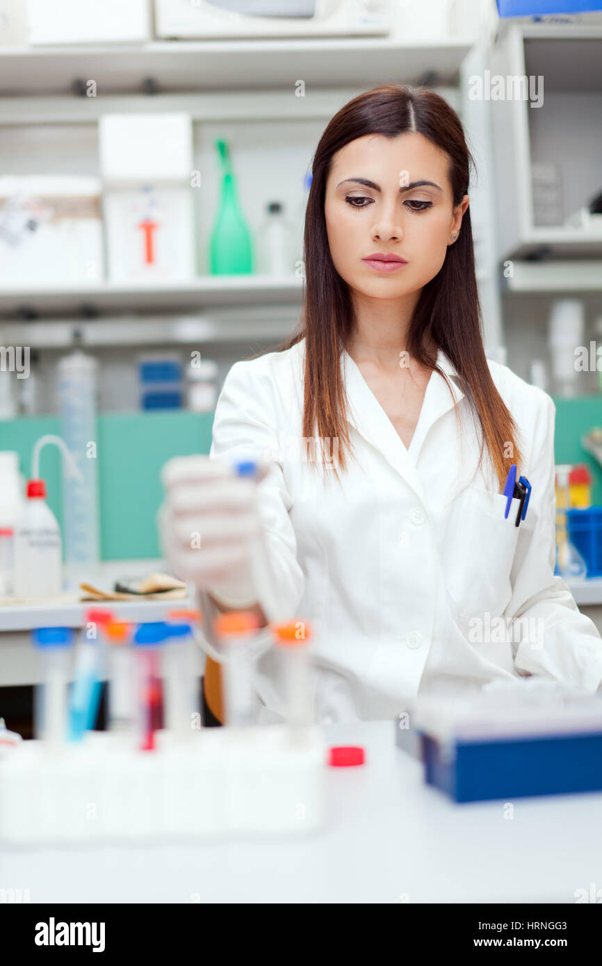 Female scientist at work in a laboratory Stock Photo - Alamy
