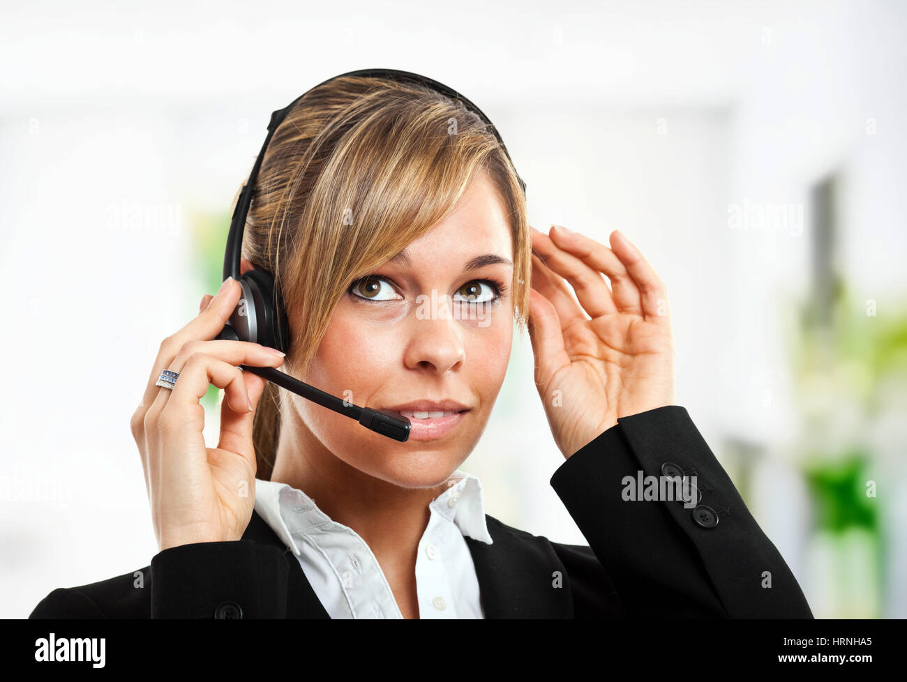 Call centre woman white back hi-res stock photography and images - Alamy