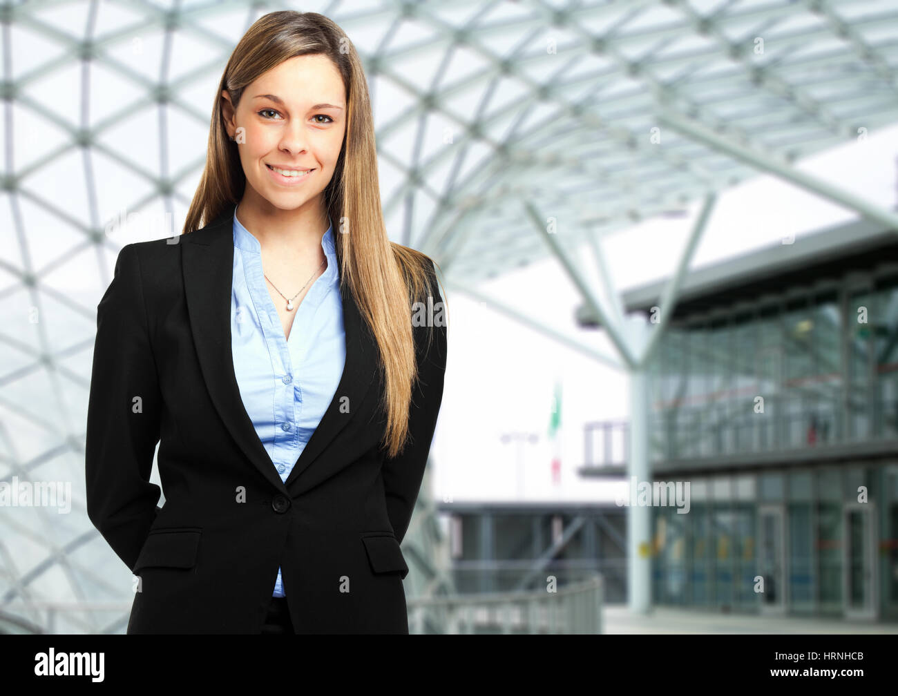 Portrait of a smiling female manager Stock Photo - Alamy