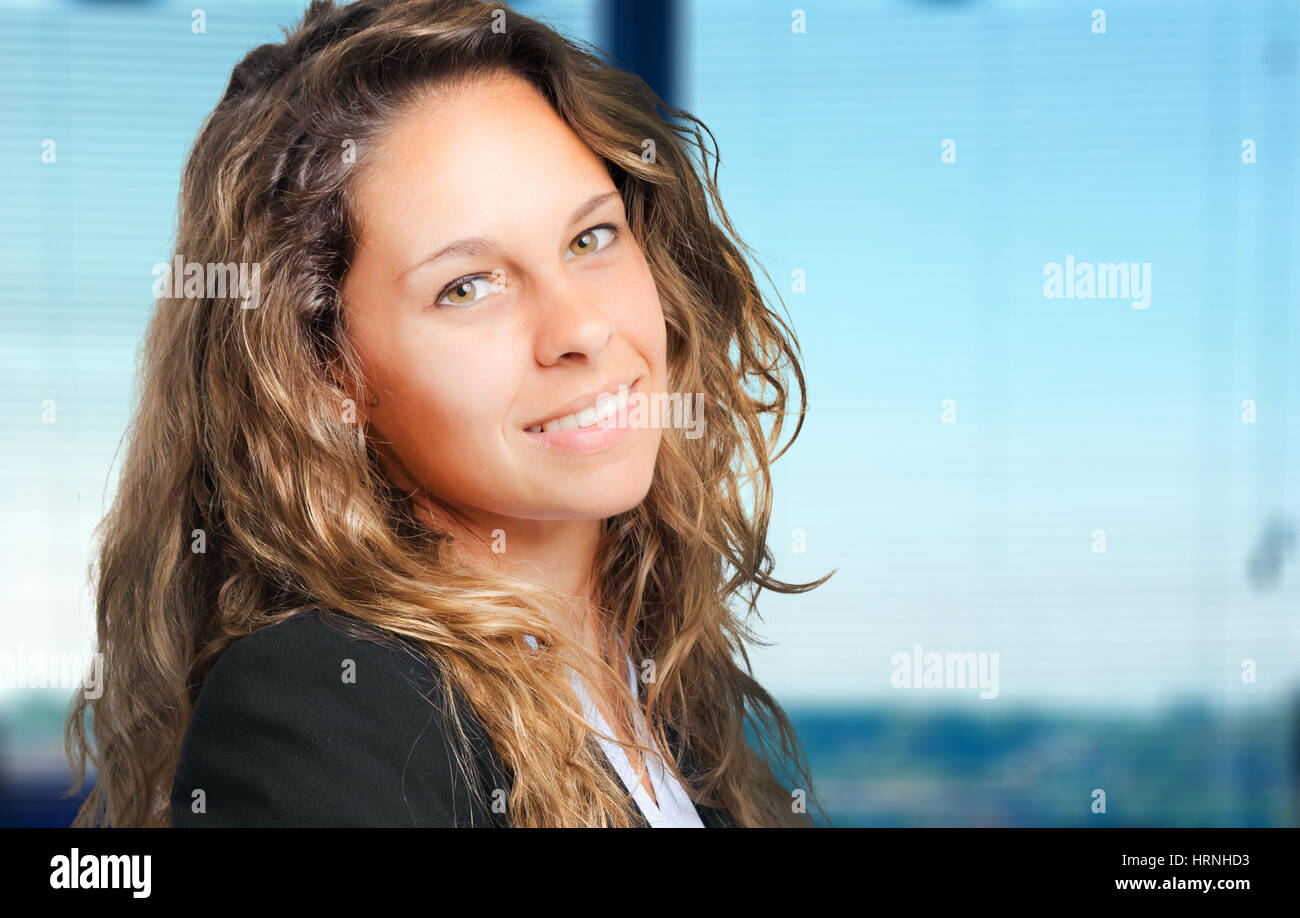 Portrait of a smiling female manager Stock Photo - Alamy