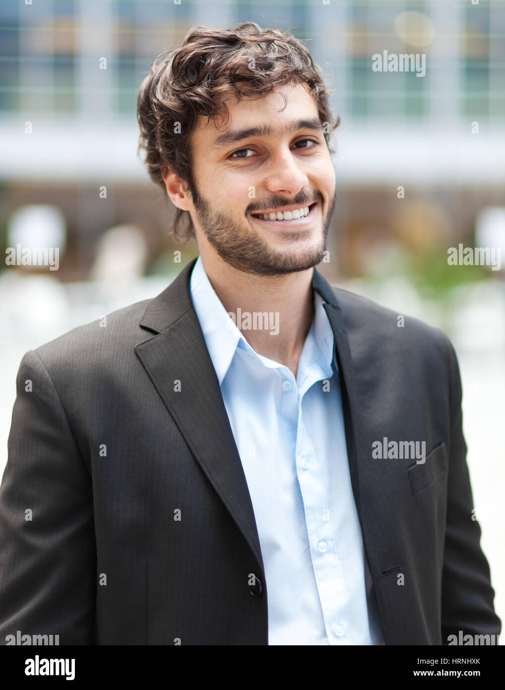 Smiling businessman portrait Stock Photo - Alamy