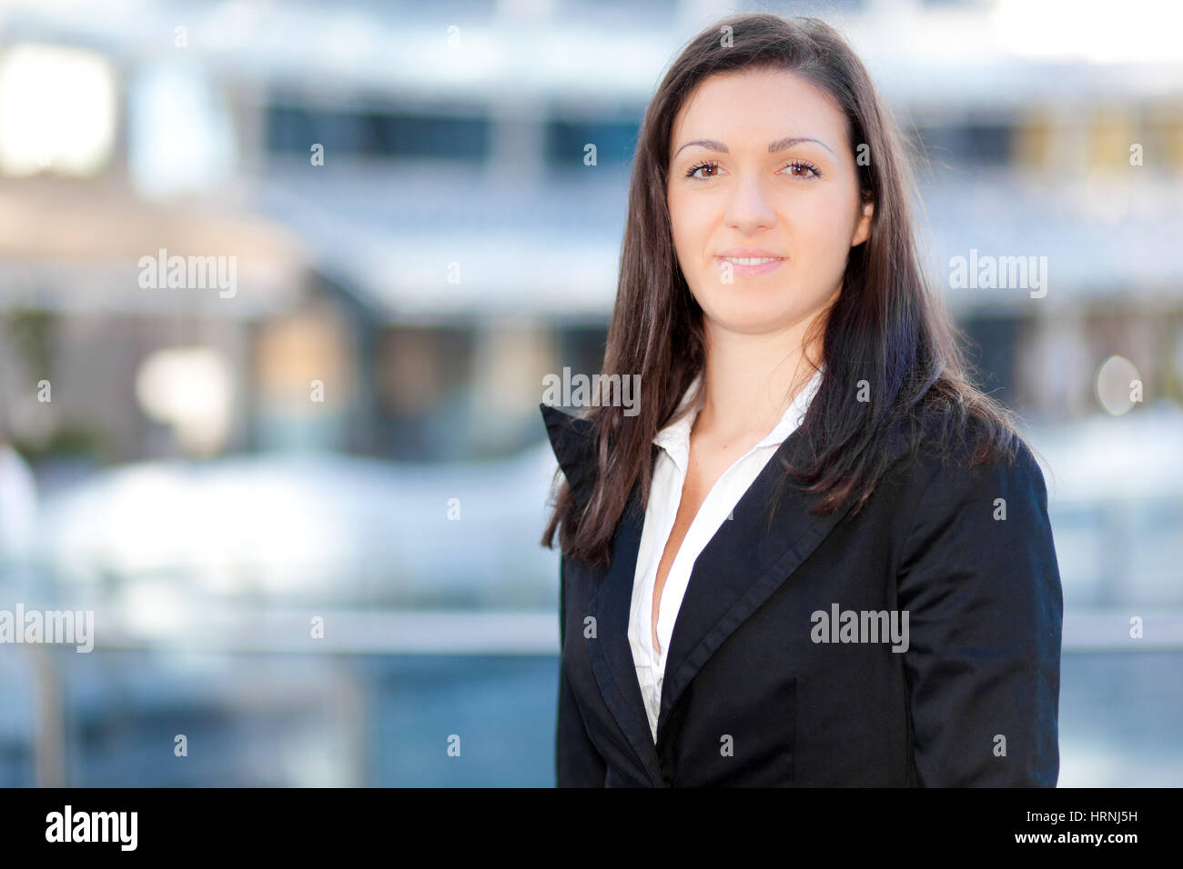 Portrait of a smiling business woman Stock Photo - Alamy