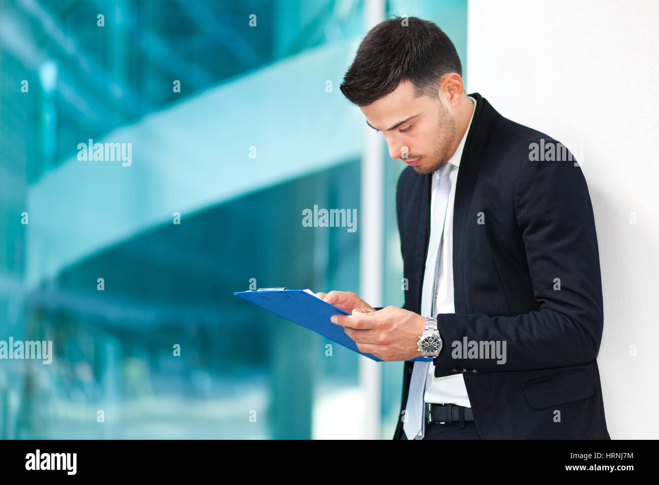 Businessman reading documents Stock Photo - Alamy Businessman reading documents Stock Photo - Alamy
