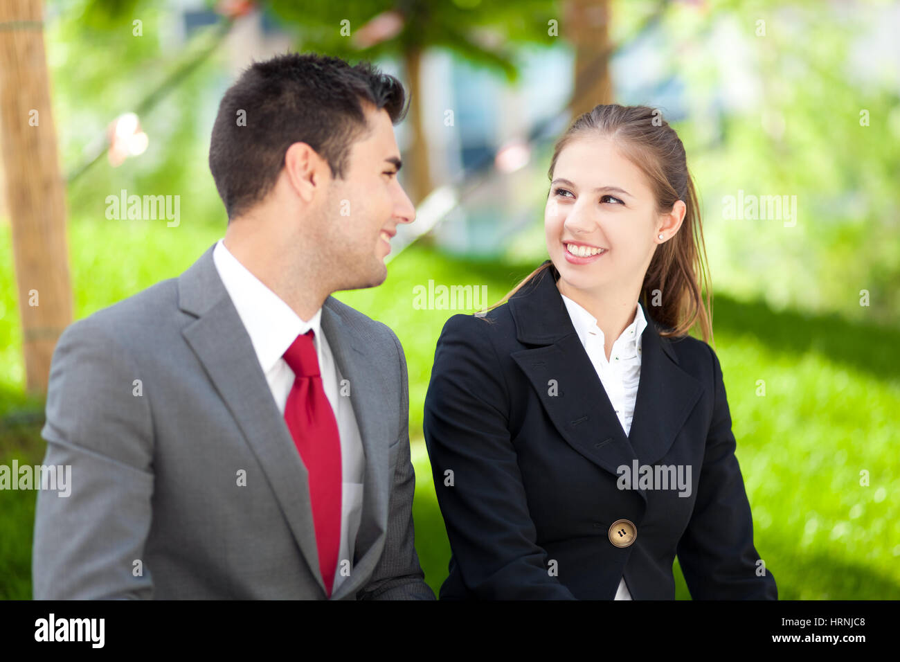 Business partners talking in an urban setting Stock Photo - Alamy
