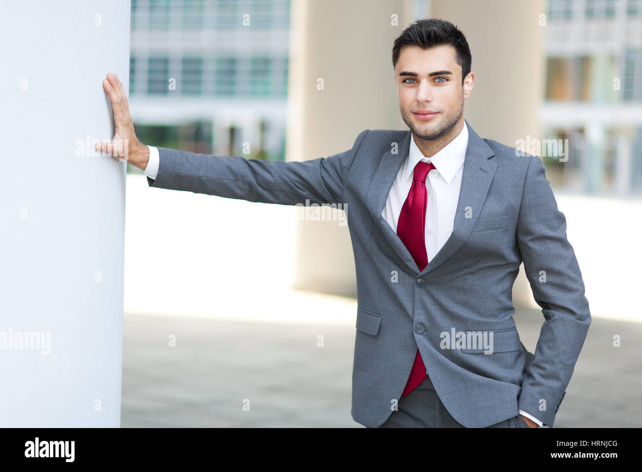 Portrait of an handsome young manager outdoor in the city Stock Photo ...