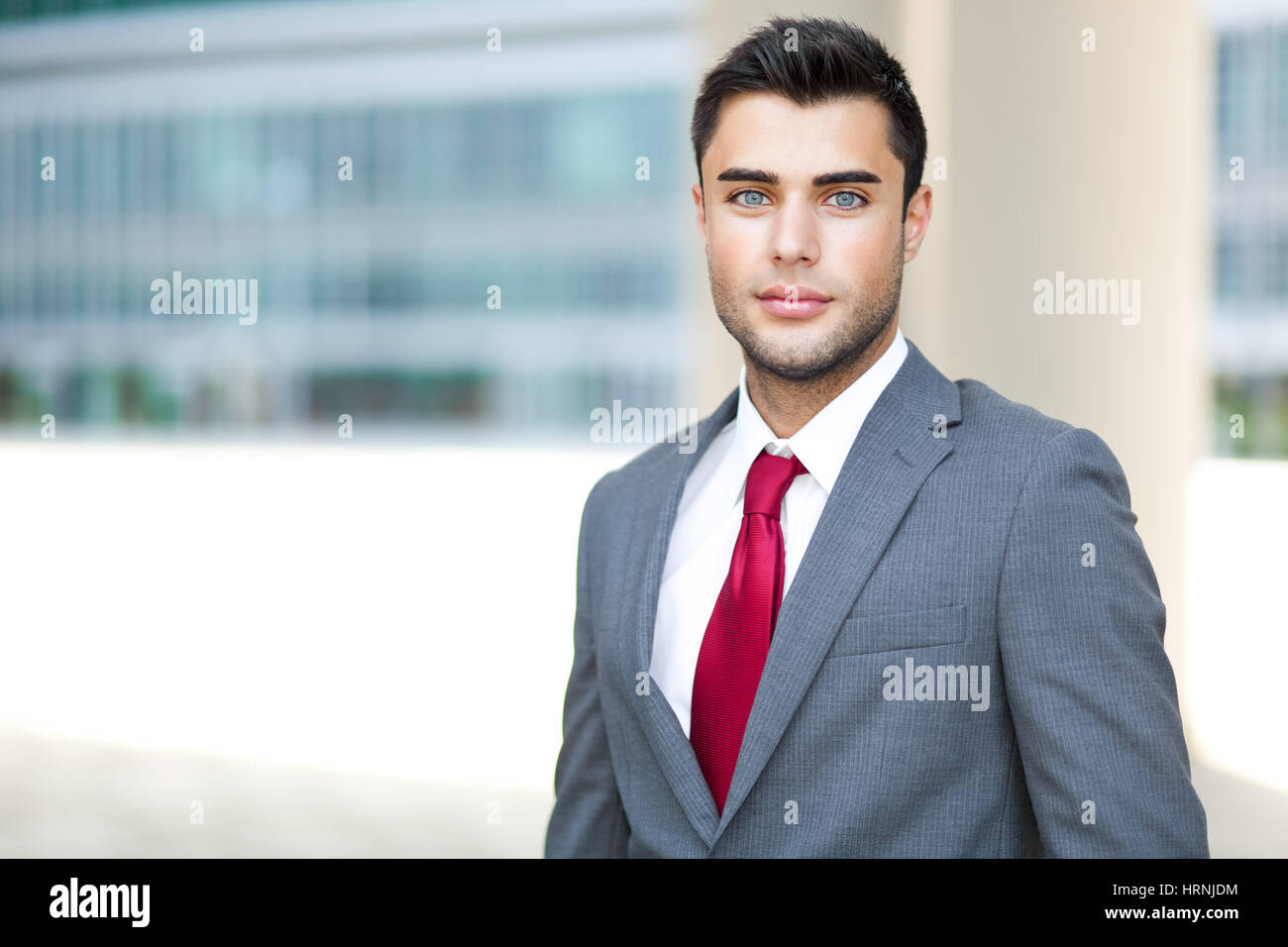 Portrait of an handsome young manager outdoor in the city Stock Photo ...