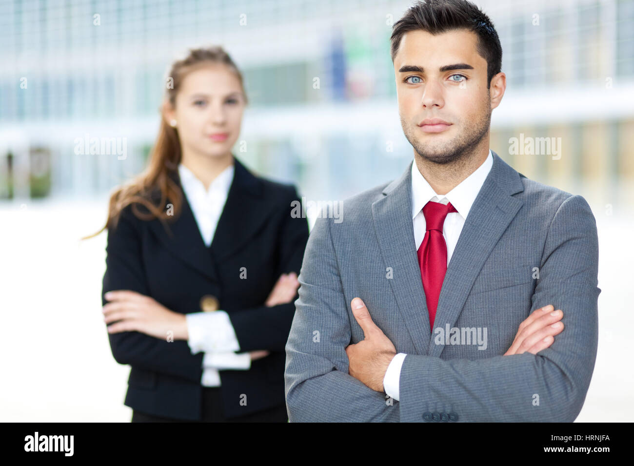Two young business people outdoor Stock Photo - Alamy