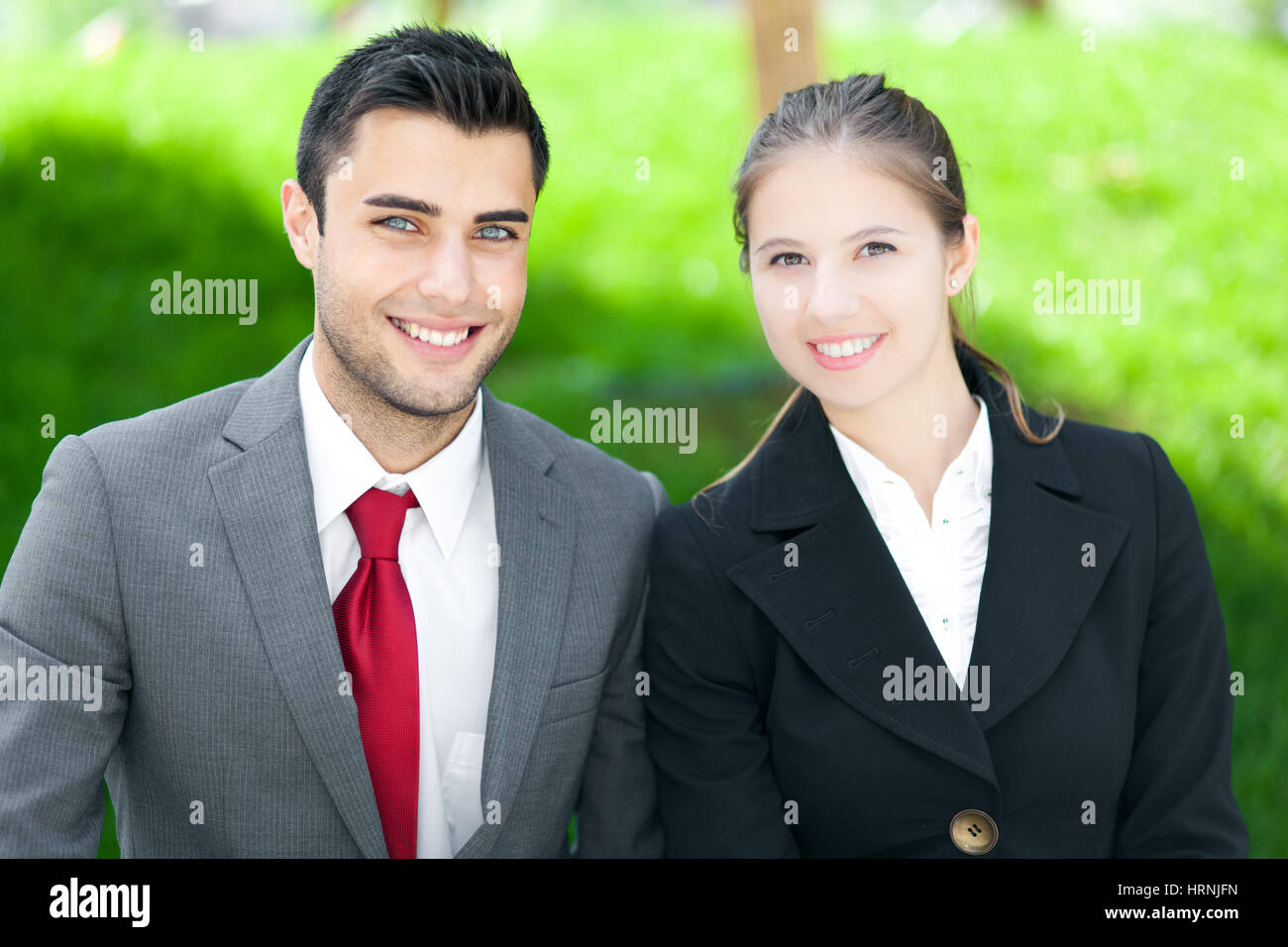 Business partners sitting outdoor Stock Photo - Alamy