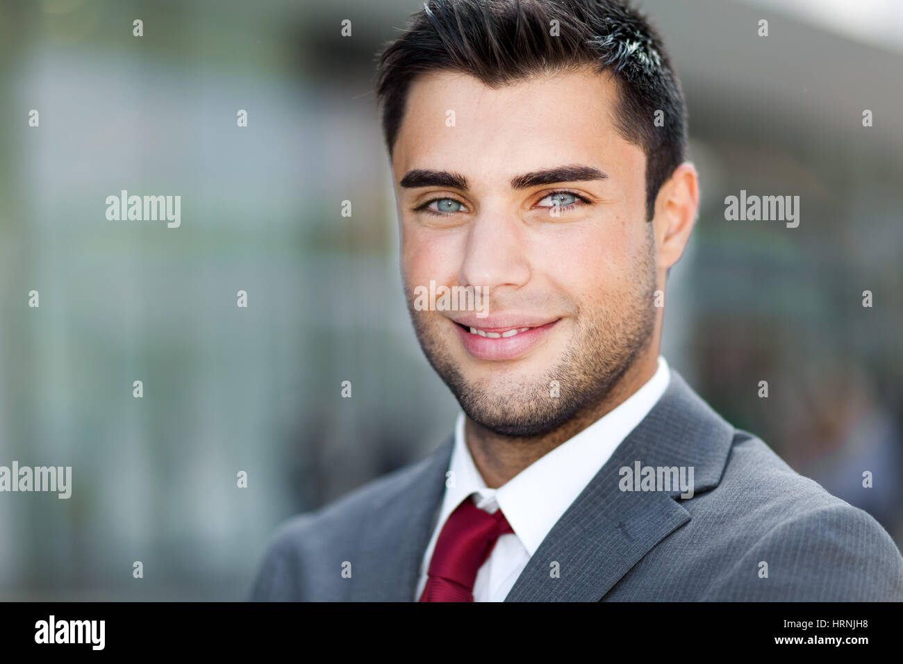 Confident business man outdoor Stock Photo - Alamy
