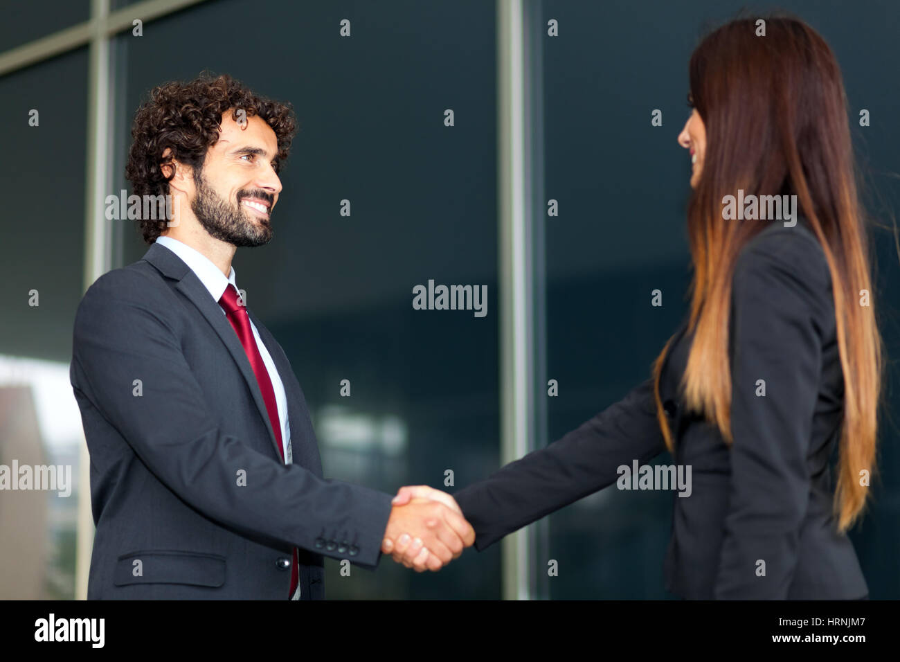 Business people handshake Stock Photo - Alamy