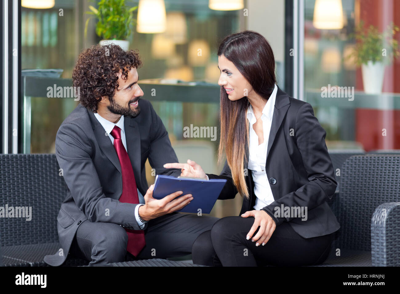 Business people signing a contract Stock Photo - Alamy