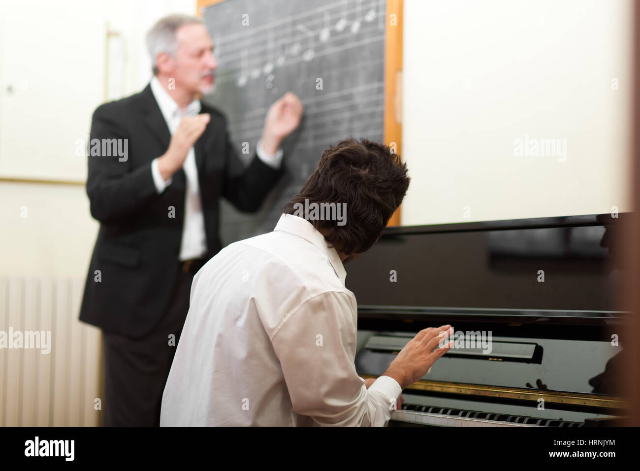 Musical instruction hi-res stock photography and images - Alamy